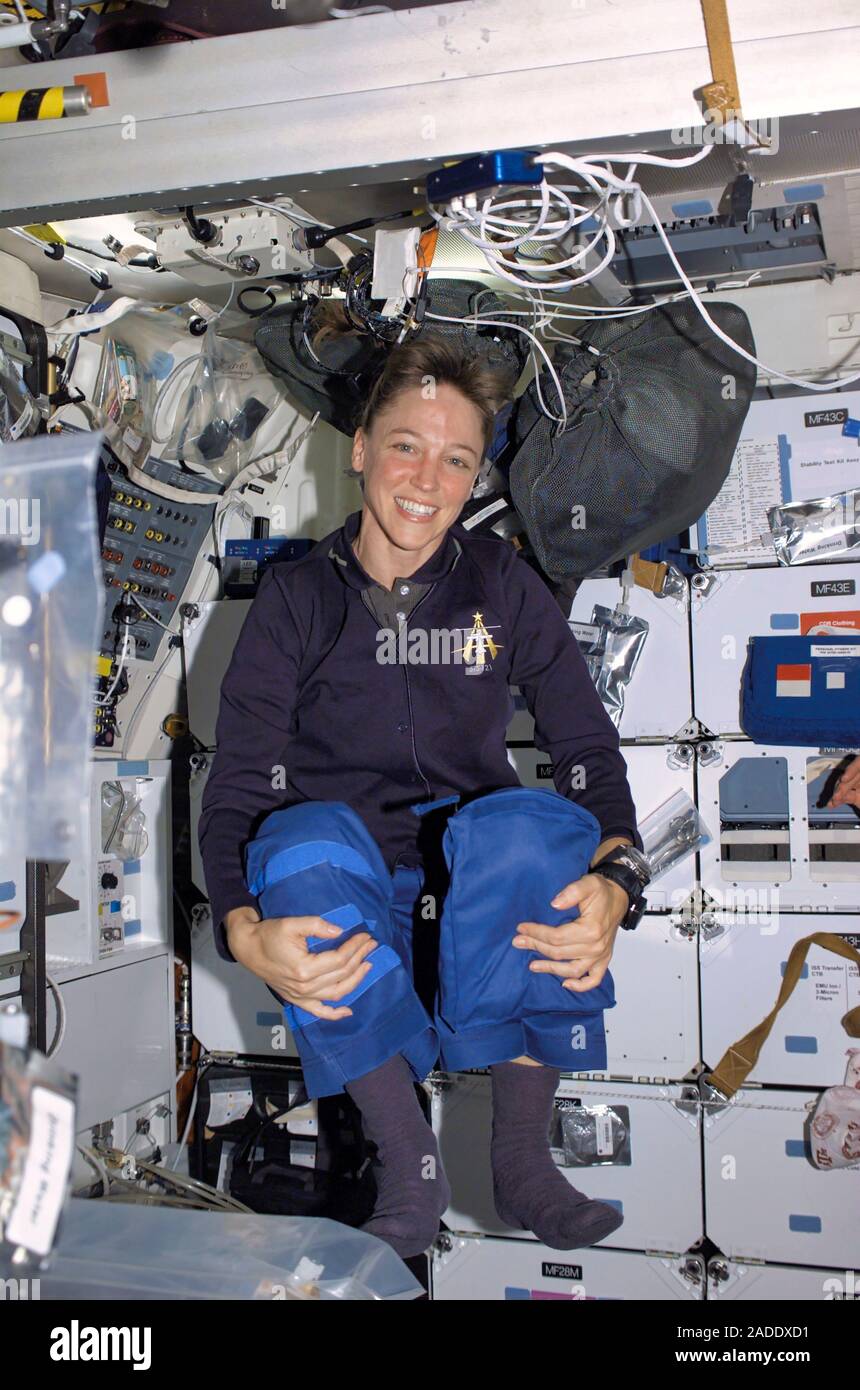 Lisa M Nowak, American astronaut, floating on the middeck of the Space ...