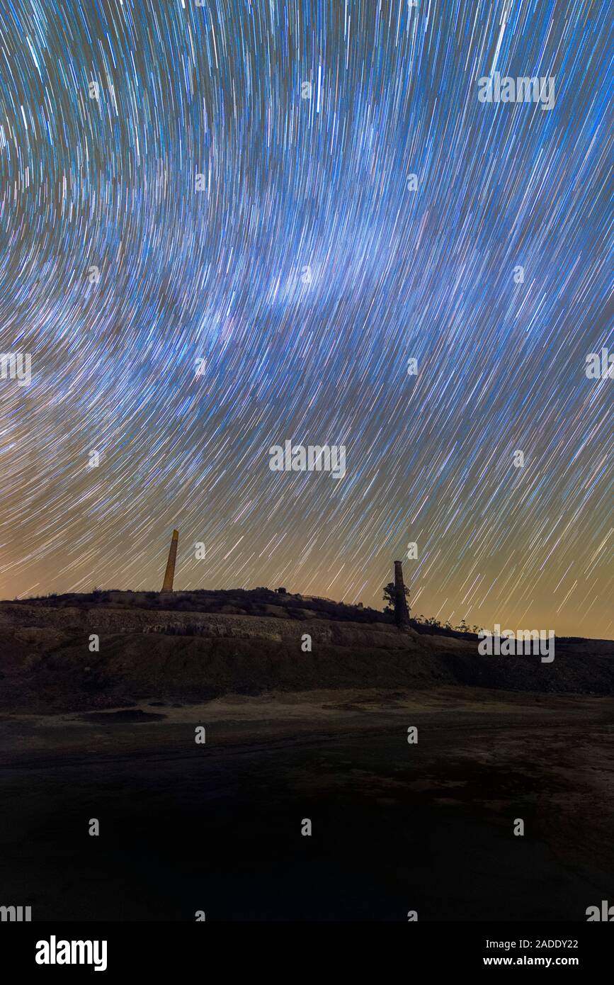 Star trails over mine. Time-exposure image of stars forming light ...