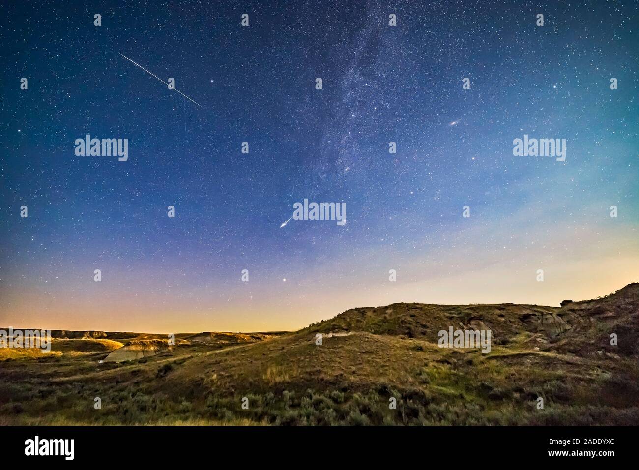 Composite image of two bright Perseid meteors over the moonlit ...