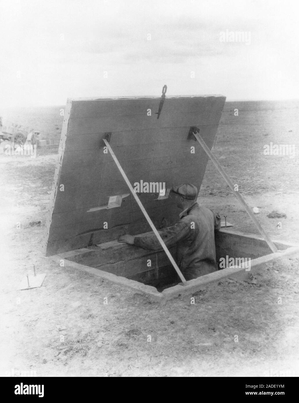 Goddard rocket research, 1930s. Observer watching the launch of a ...