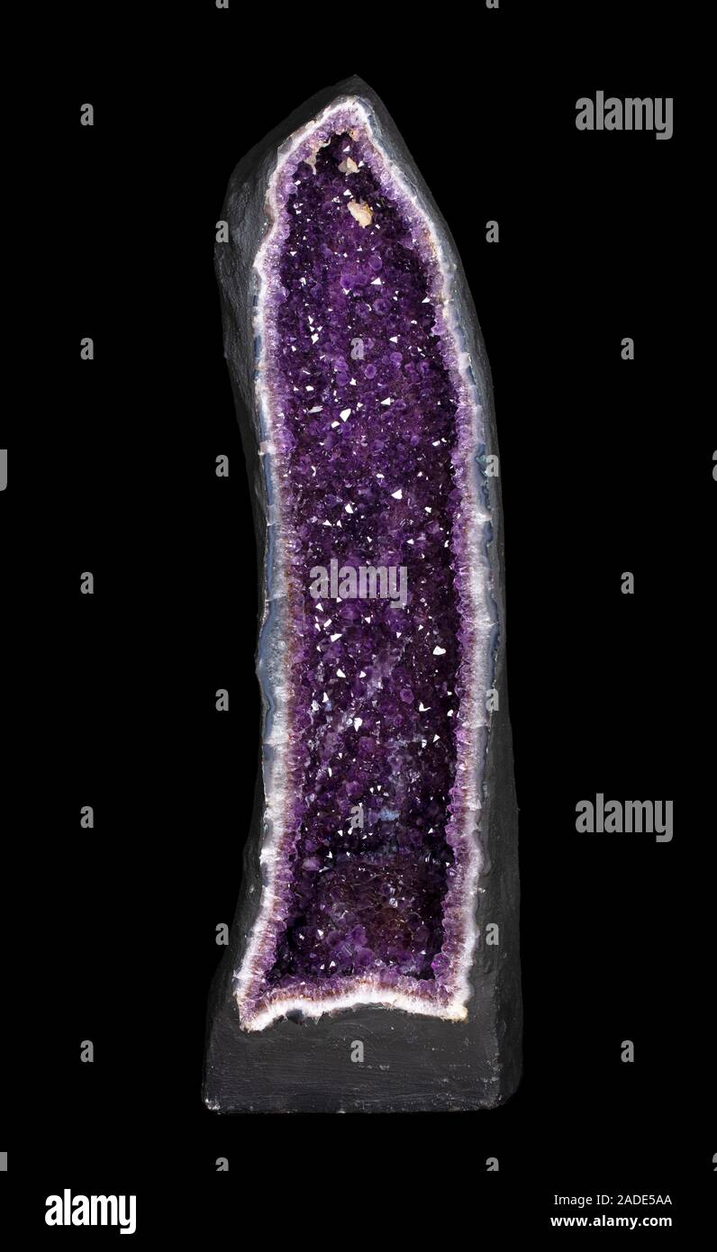 Amethyst geode. Geode cut open to reveal amethyst crystals inside ...