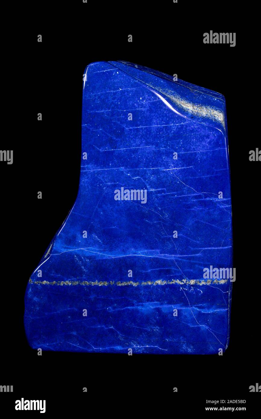 Lapis lazuli specimen. Block of polished lapis lazuli mounted on a base ...