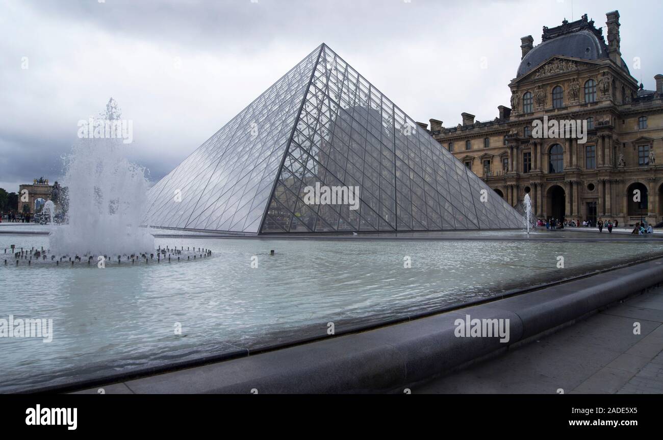 The glass pyramid in the Cour Napolean courtyard at the Palais du ...