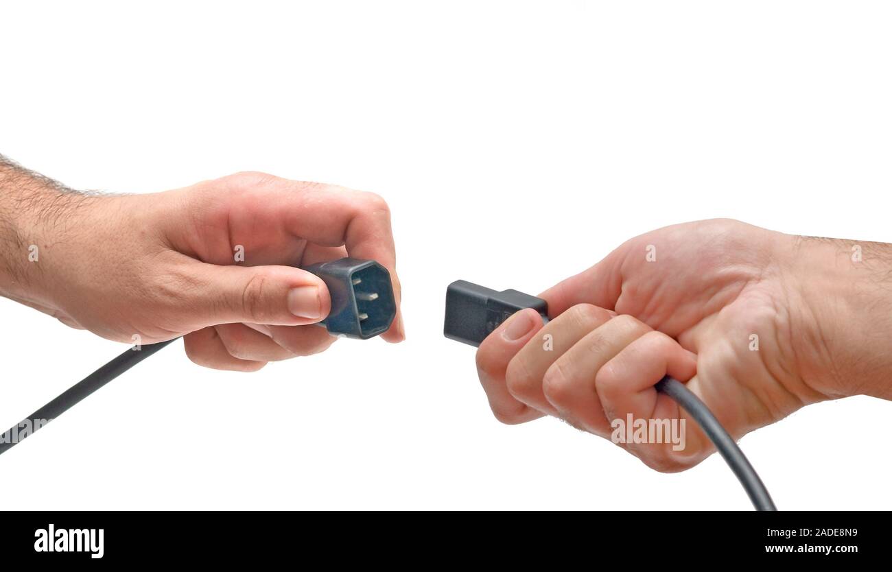 Male hand connecting three pin hi-res stock photography and images - Alamy