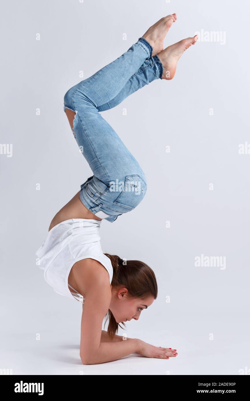 Female dancer during handstand in studio Stock Photo - Alamy