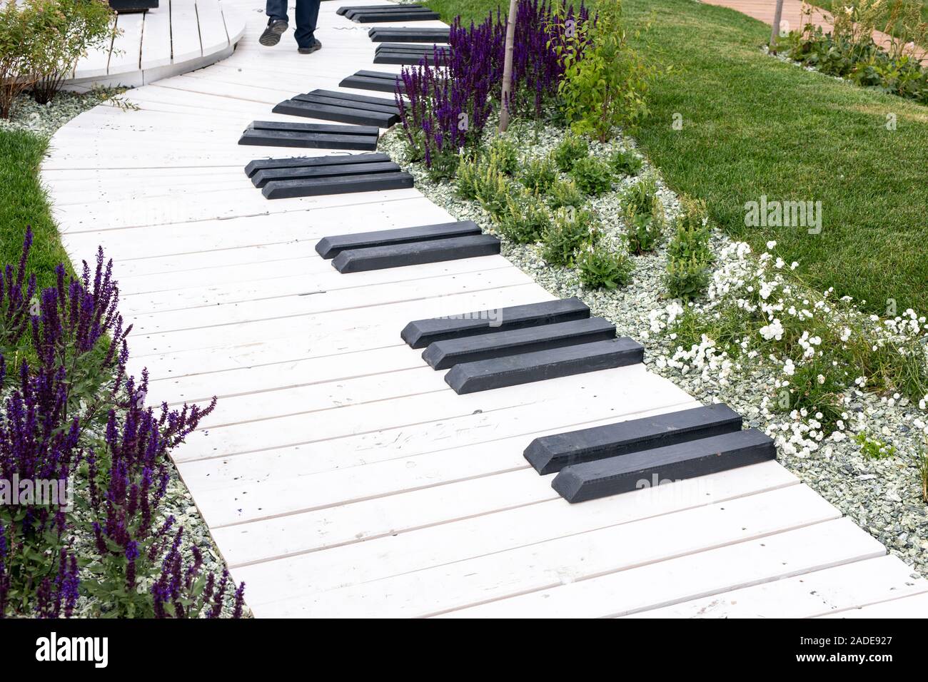 Walking path like piano keys. wooden steps in the form of piano keys ...