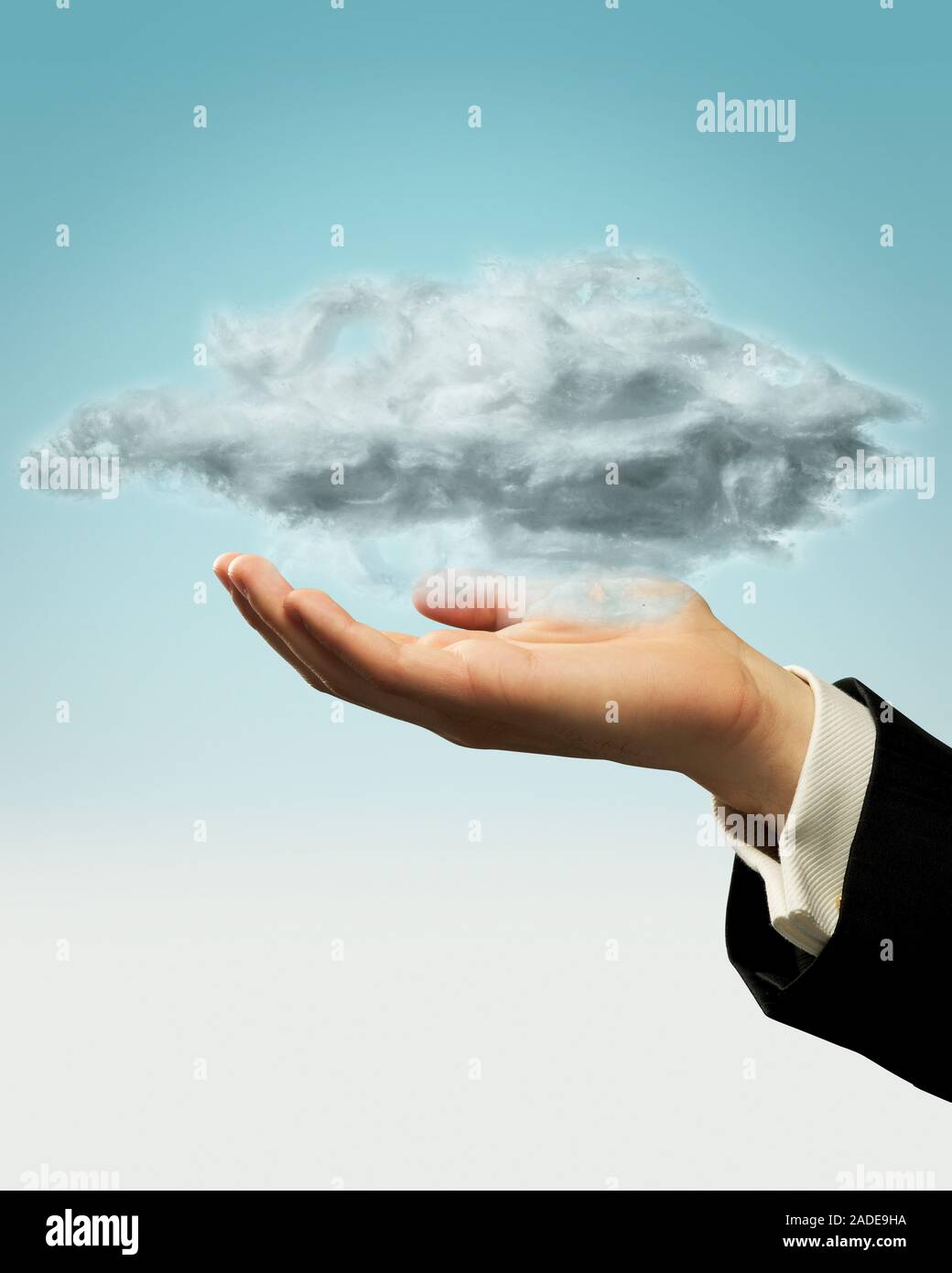 Hand holding cloud Stock Photo - Alamy