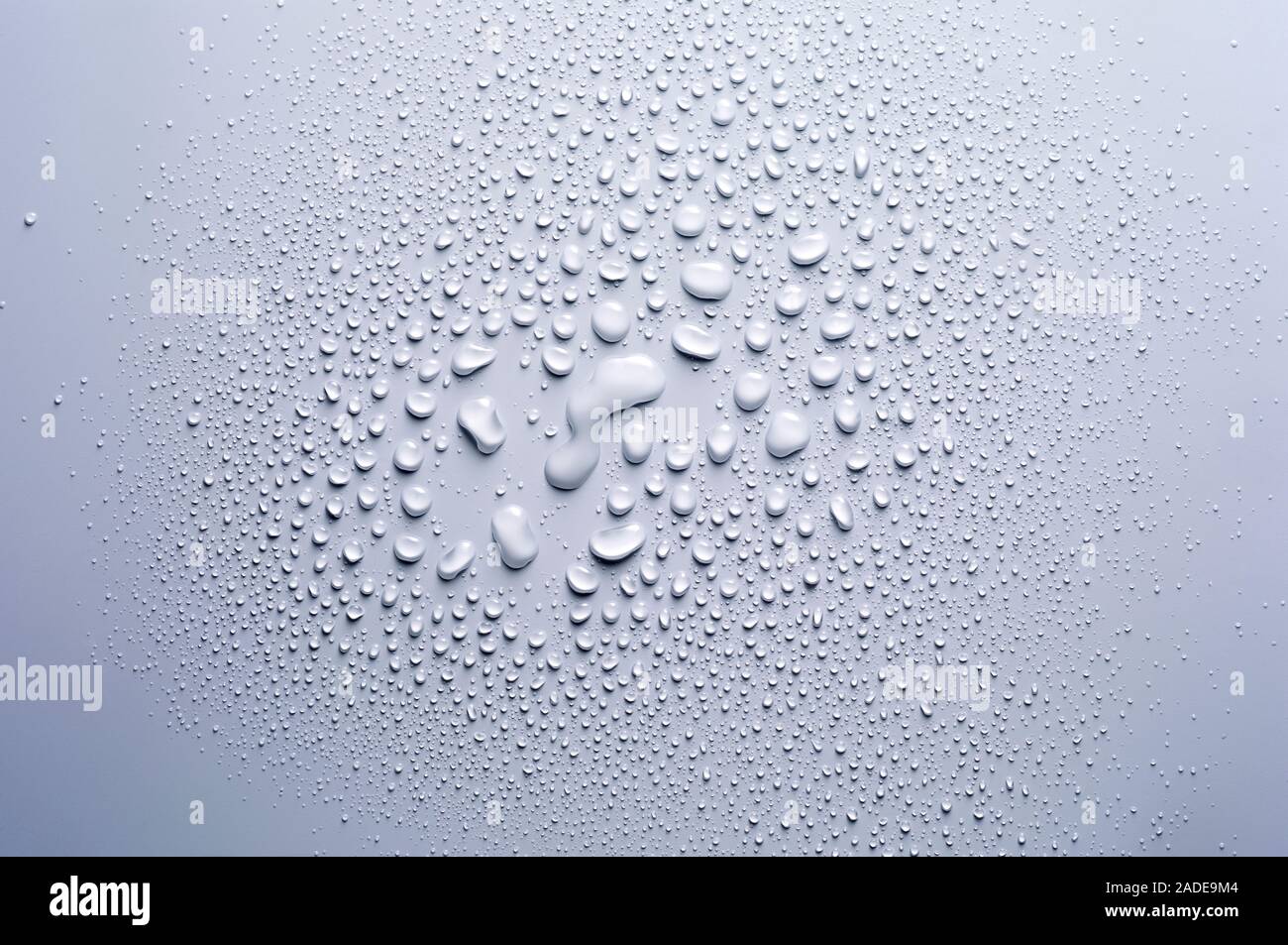 Water droplets on white surface Stock Photo - Alamy