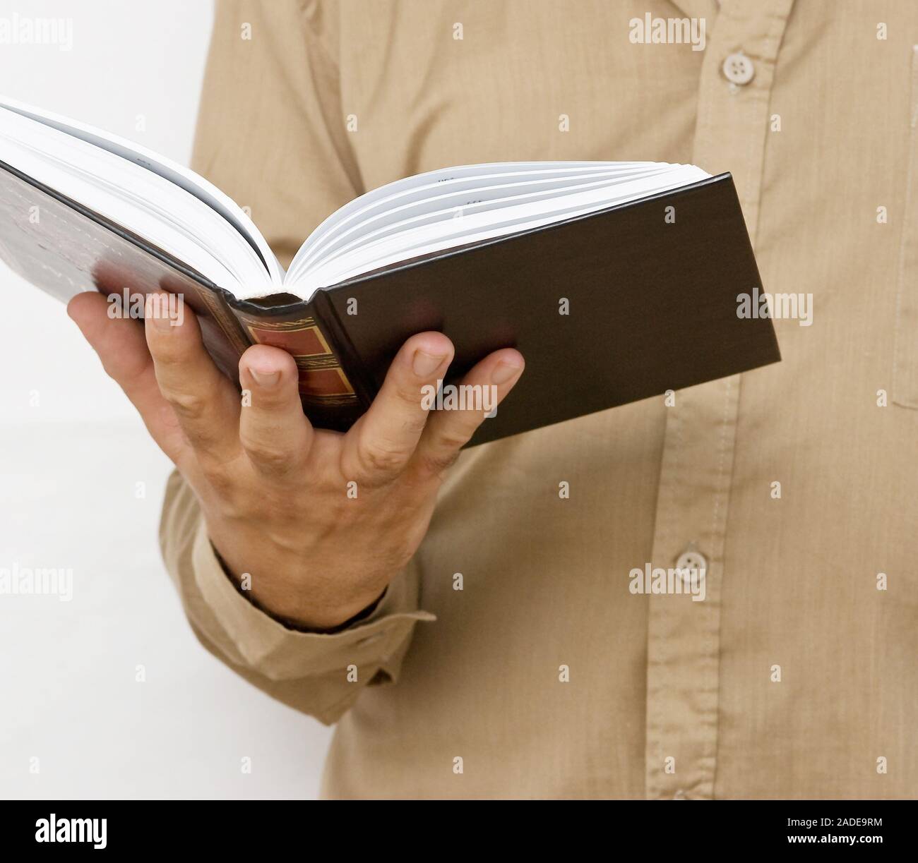 Man reading book Stock Photo - Alamy