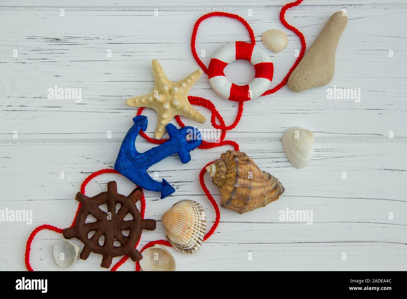 marine decor. starfish lifebuoy steering wheel anchor sea shells on ...