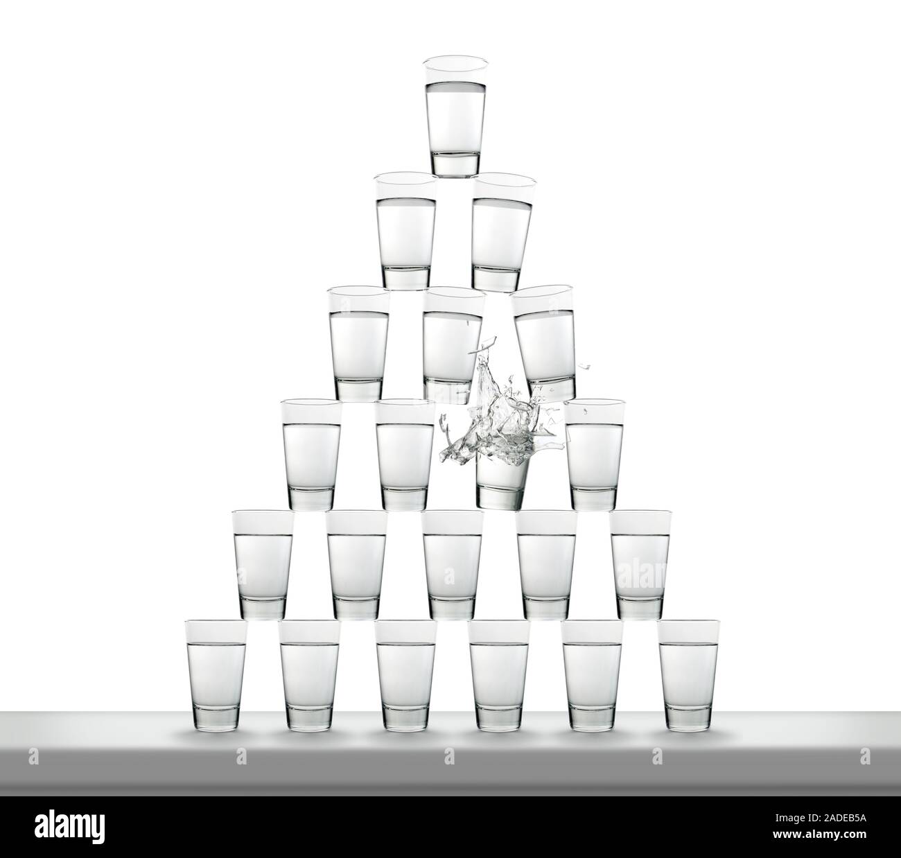 Falling pyramid of glasses Stock Photo - Alamy