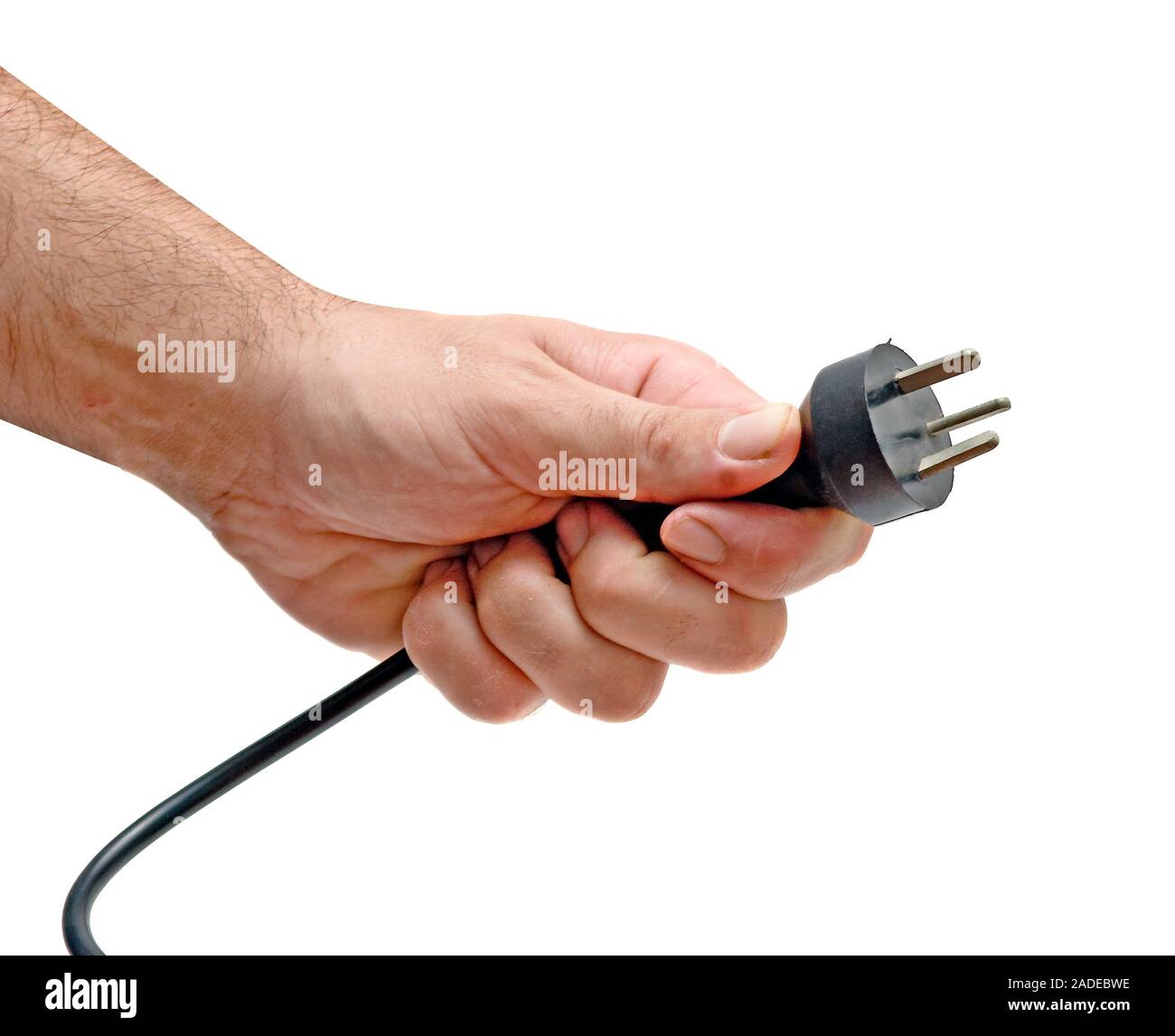Hand with three-pin power plug Stock Photo - Alamy