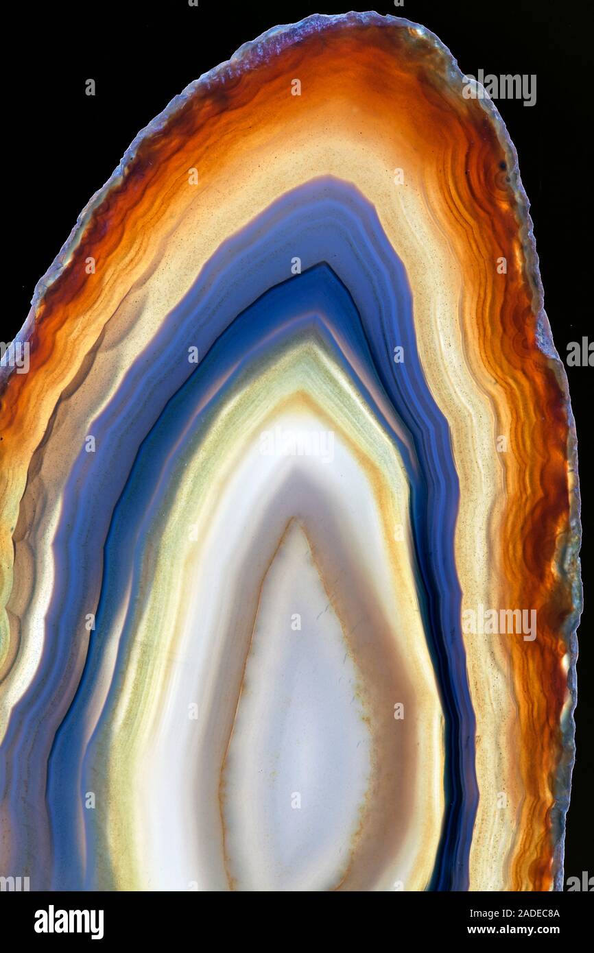 Slice of agate thinly cut from a nodule or geode and photographed in ...