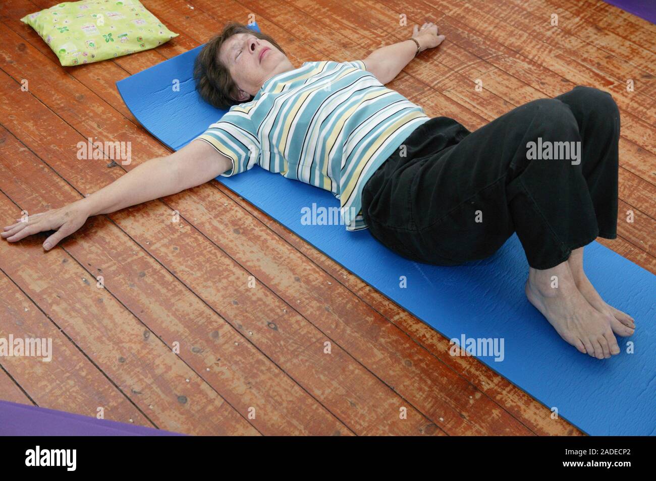 Woman at an over 60s yoga class, the Sybil Levin Centre, Age Concern ...