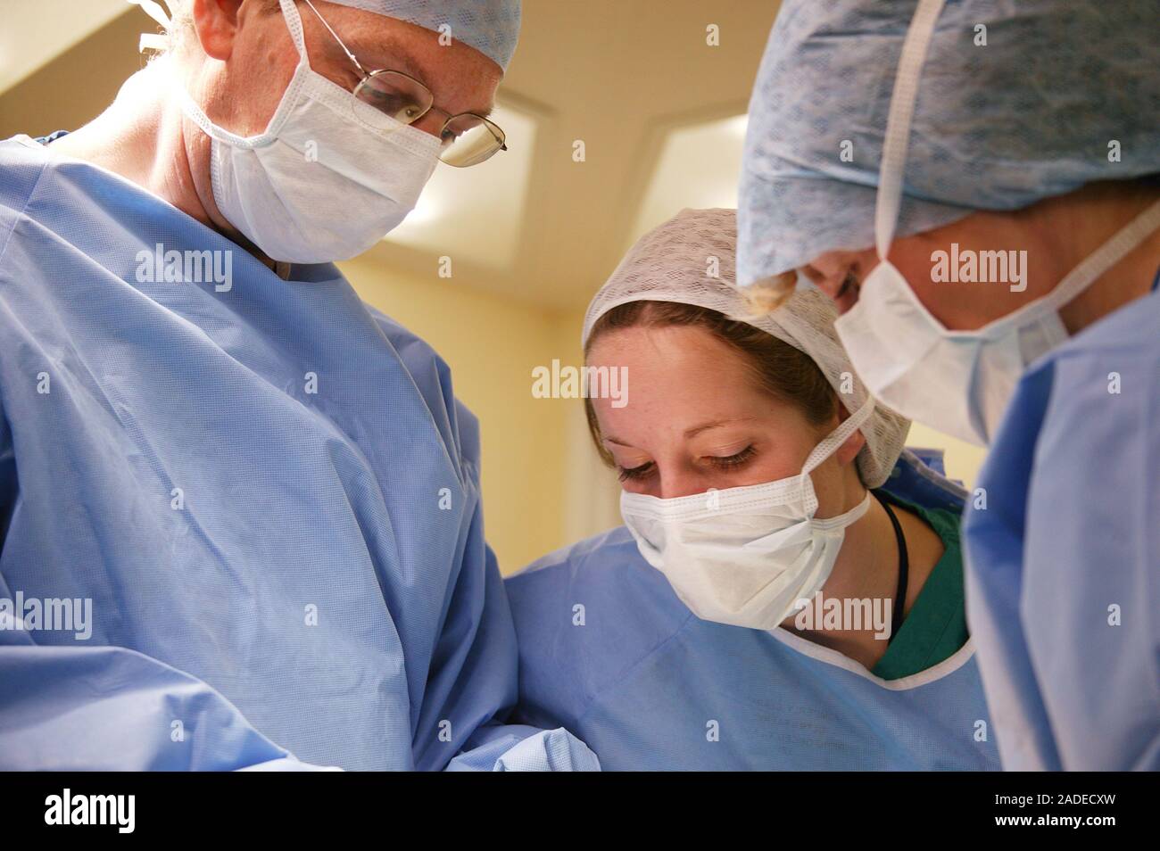 Close-up of Surgeon teaching student Doctor in operation procedures in ...