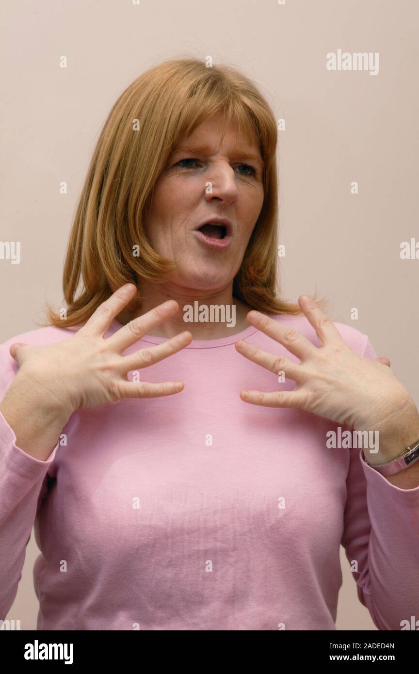 Single parent using sign language in a meeting in her office Stock ...