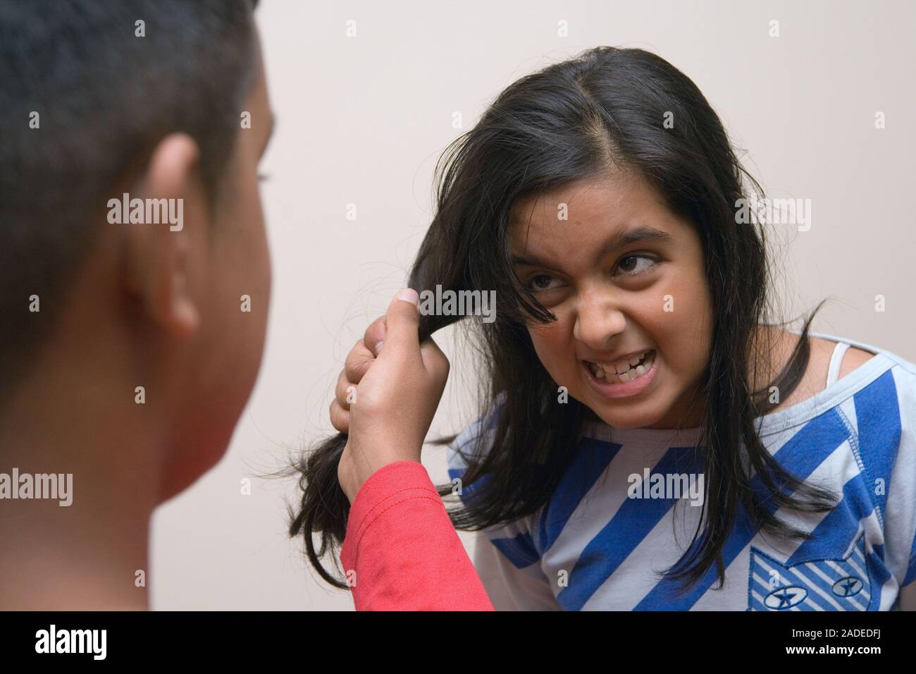 Brother and sister fighting Stock Photo - Alamy