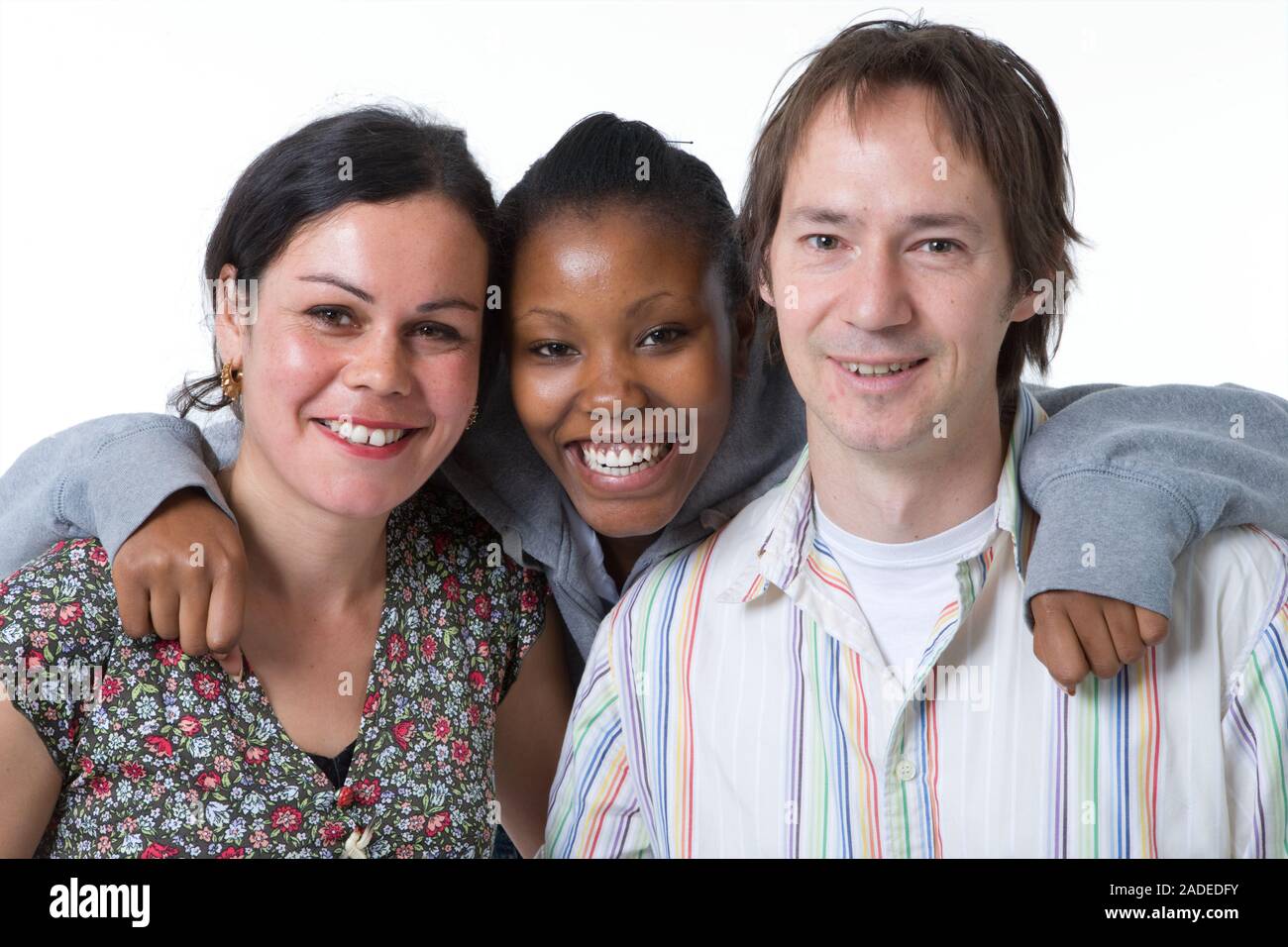 Three friends, smiling Stock Photo - Alamy