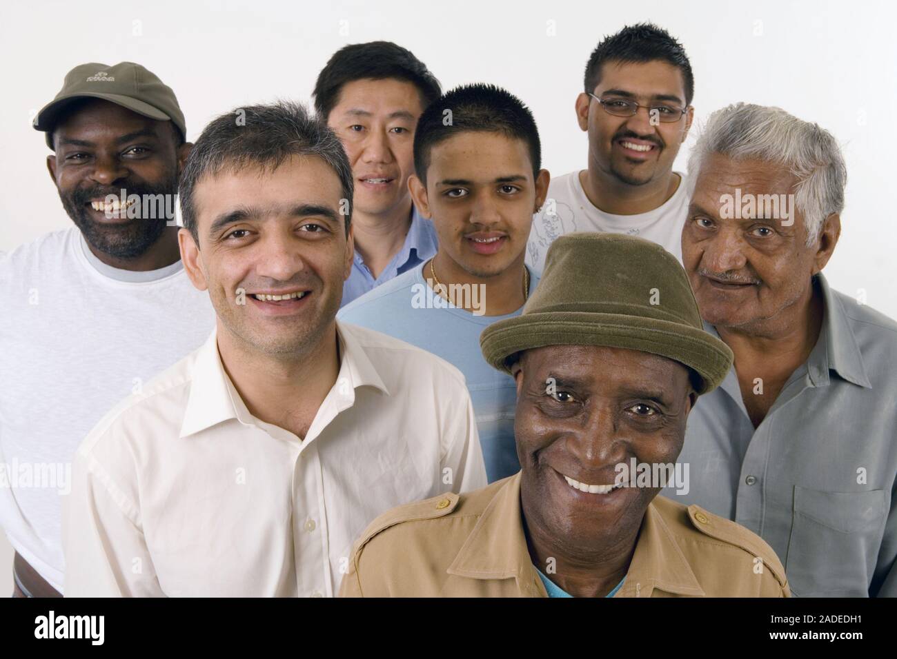 Multiracial Group of men standing together Stock Photo - Alamy