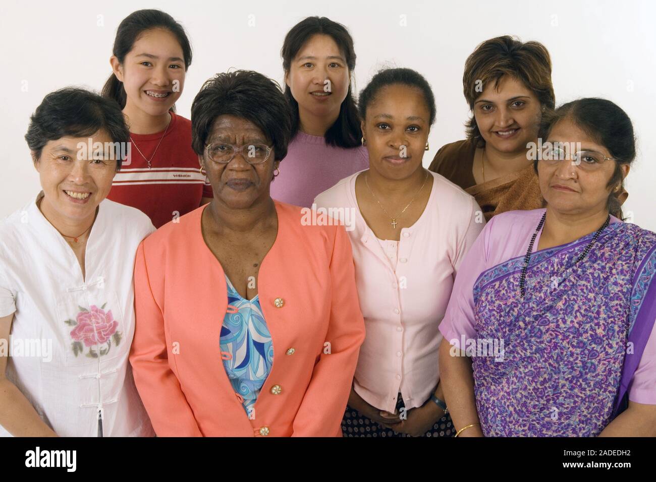 Multiracial Group of women standing together Stock Photo - Alamy