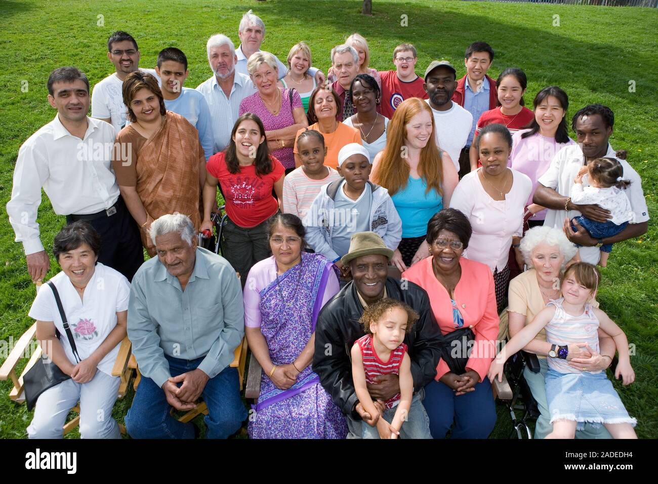 Large multiracial group of people including various family members ...