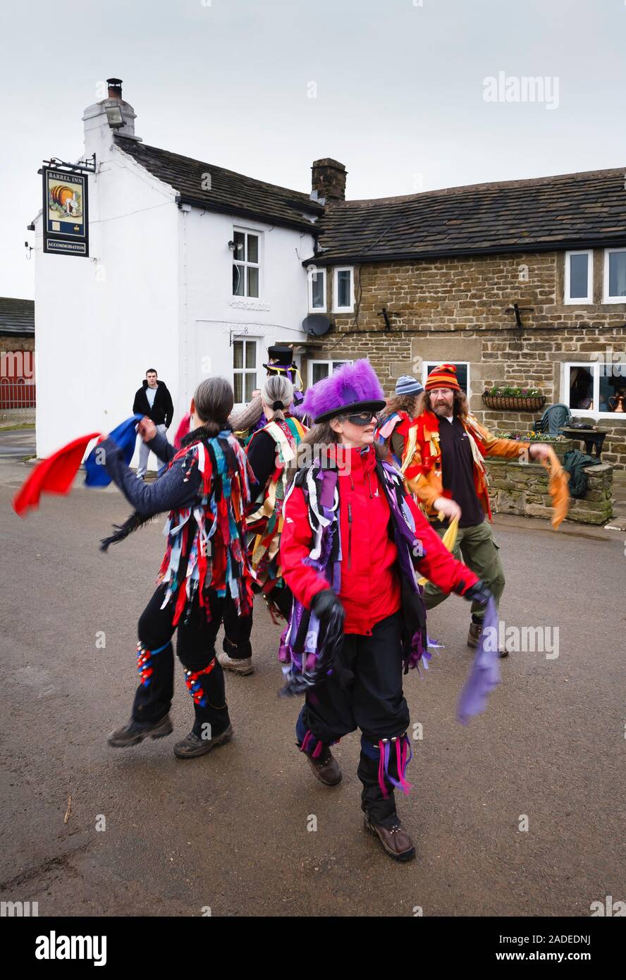 PEAK DISTRICT, UK - January 29, 2012. Morris dancers perform a ...