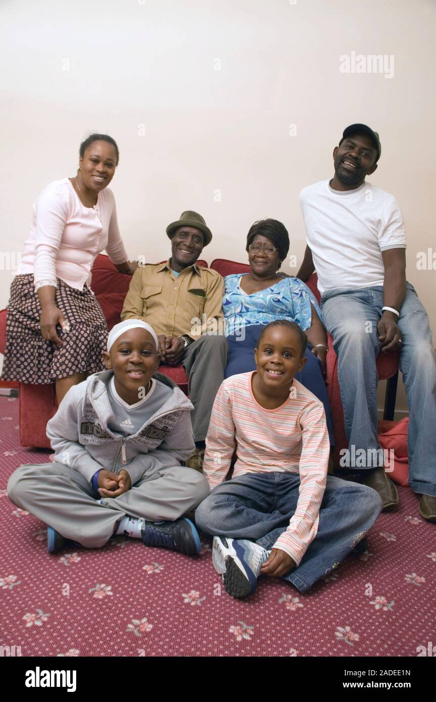 Three generations of family at home together Stock Photo - Alamy