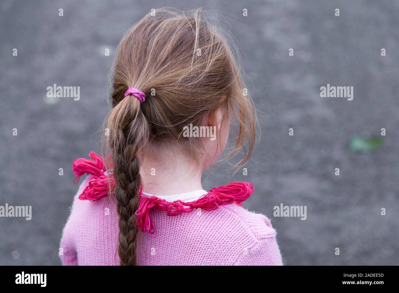 Back view of young child, alone Stock Photo - Alamy