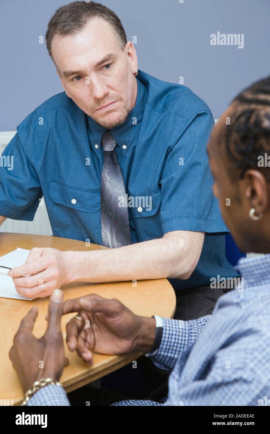 Two men in an interview situation Stock Photo - Alamy