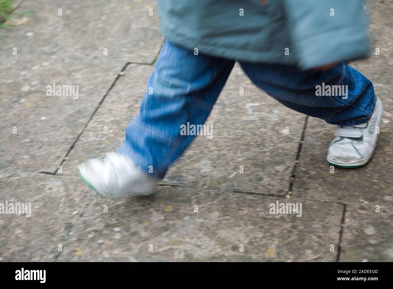 Toddler's feet running Stock Photo - Alamy