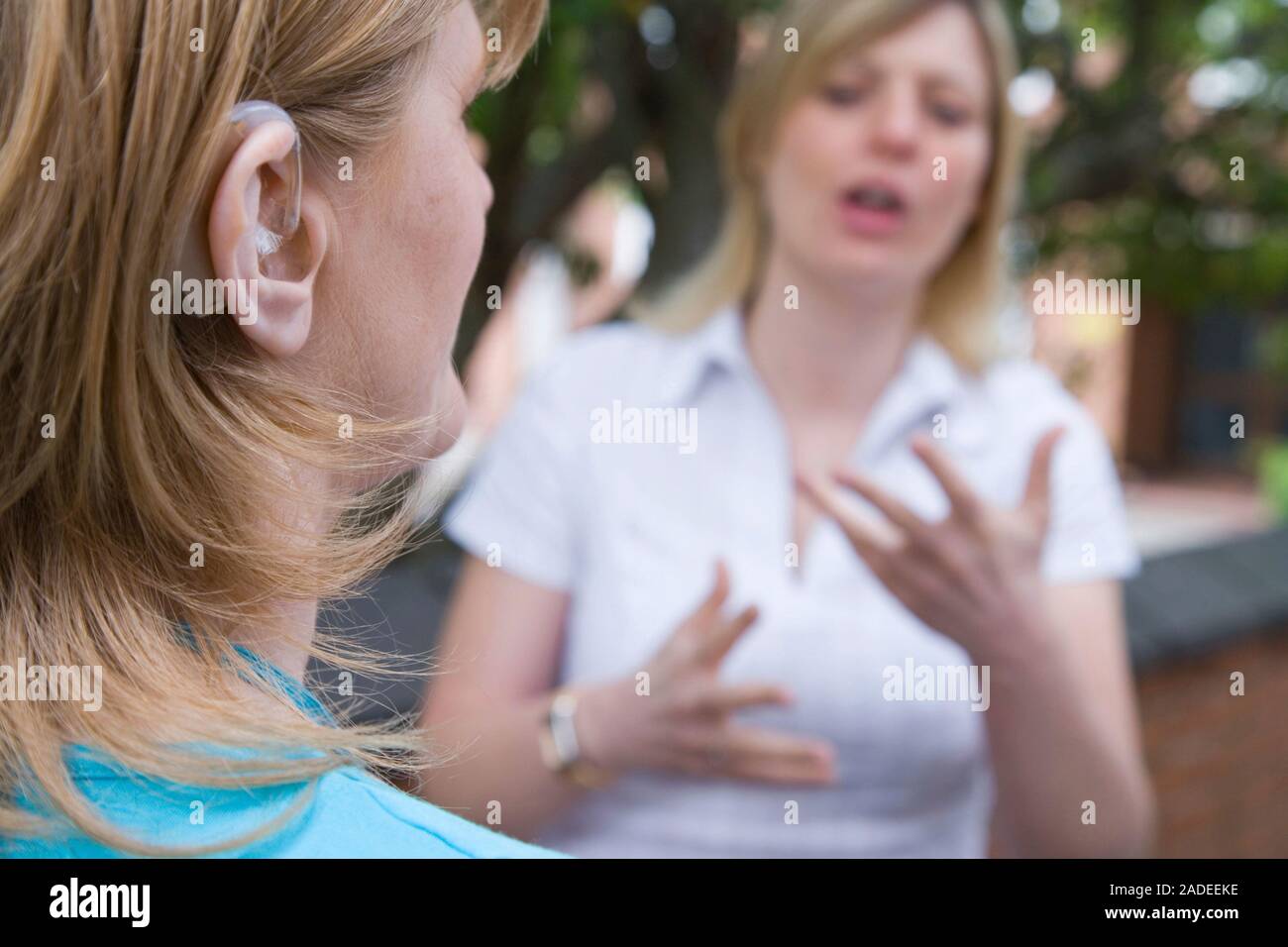 Women using sign language at The Nottinghamshire Deaf Society Stock ...