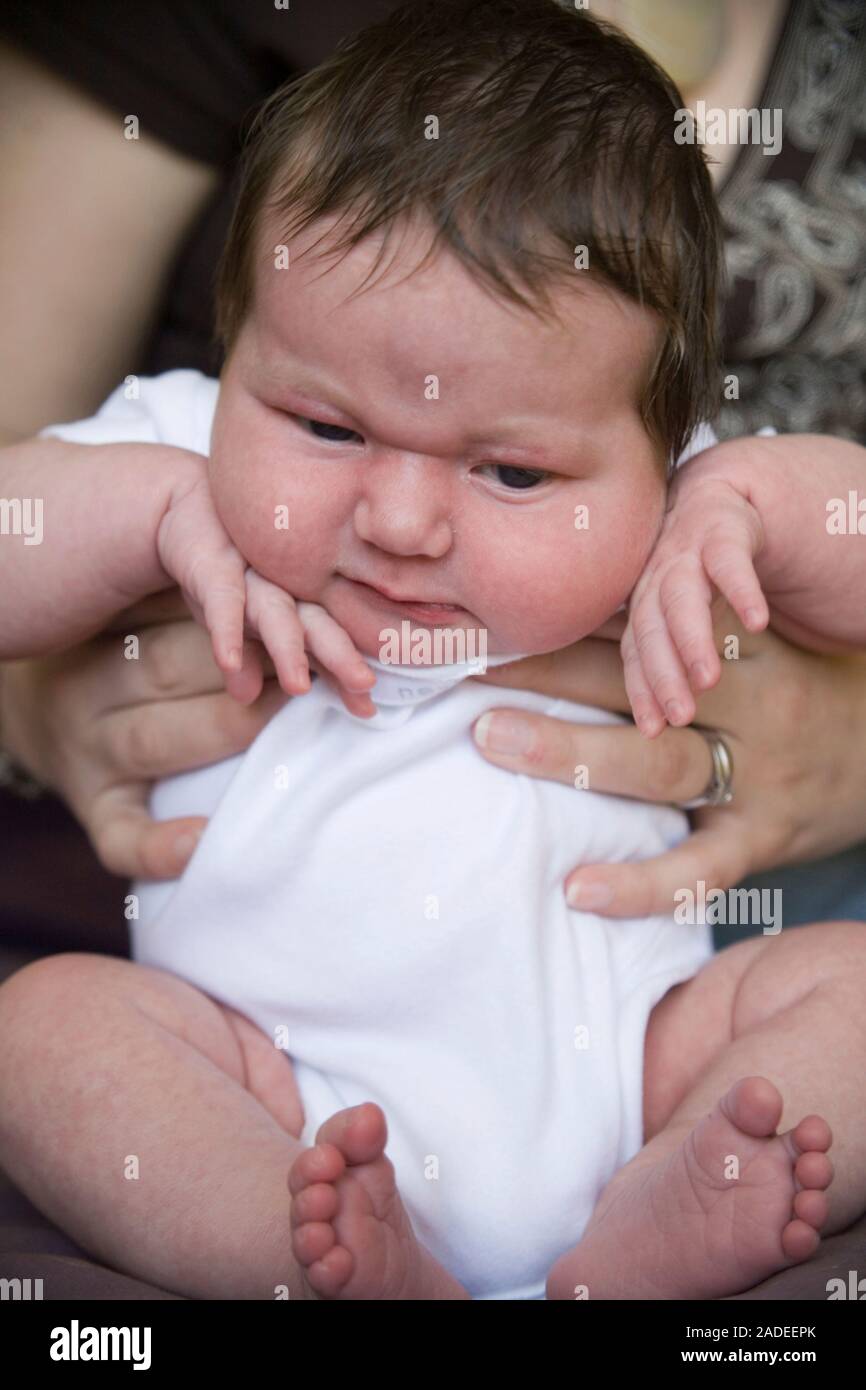 Mother holding newborn baby Stock Photo - Alamy Mother holding newborn baby Stock Photo - Alamy