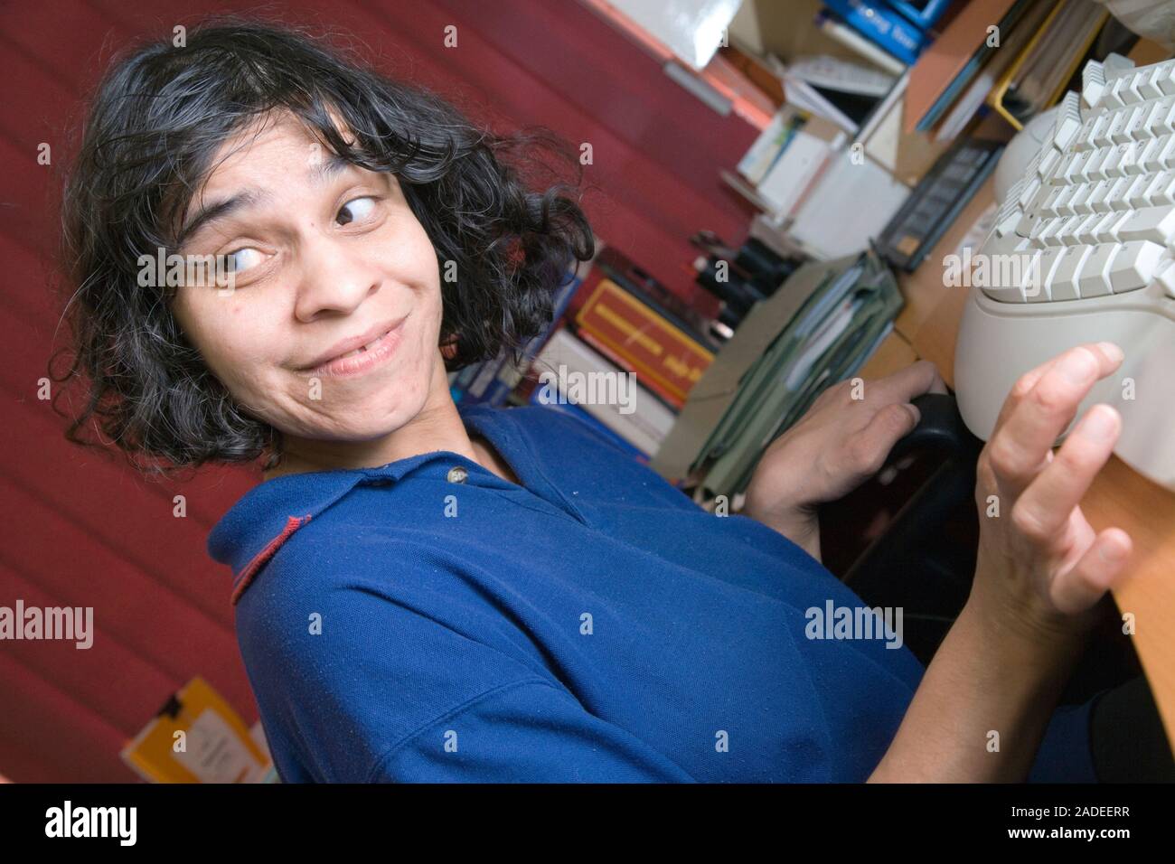 Disabled female meetings representative at work on a computer ...
