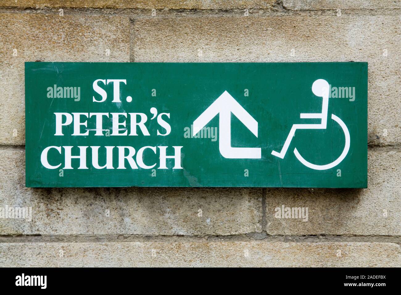 Disability access sign showing alternative entrance to church Stock ...