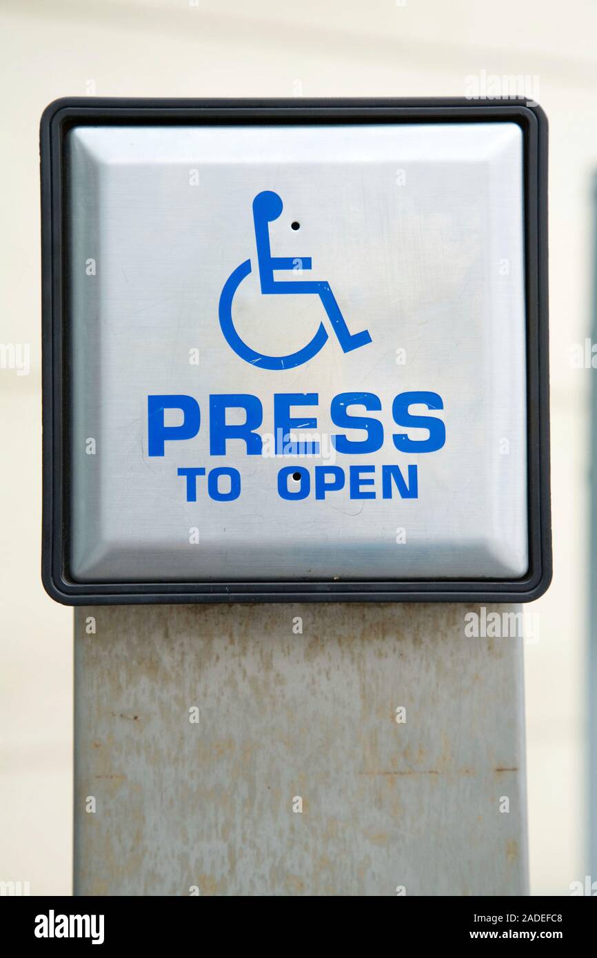 Disability access door button Stock Photo - Alamy