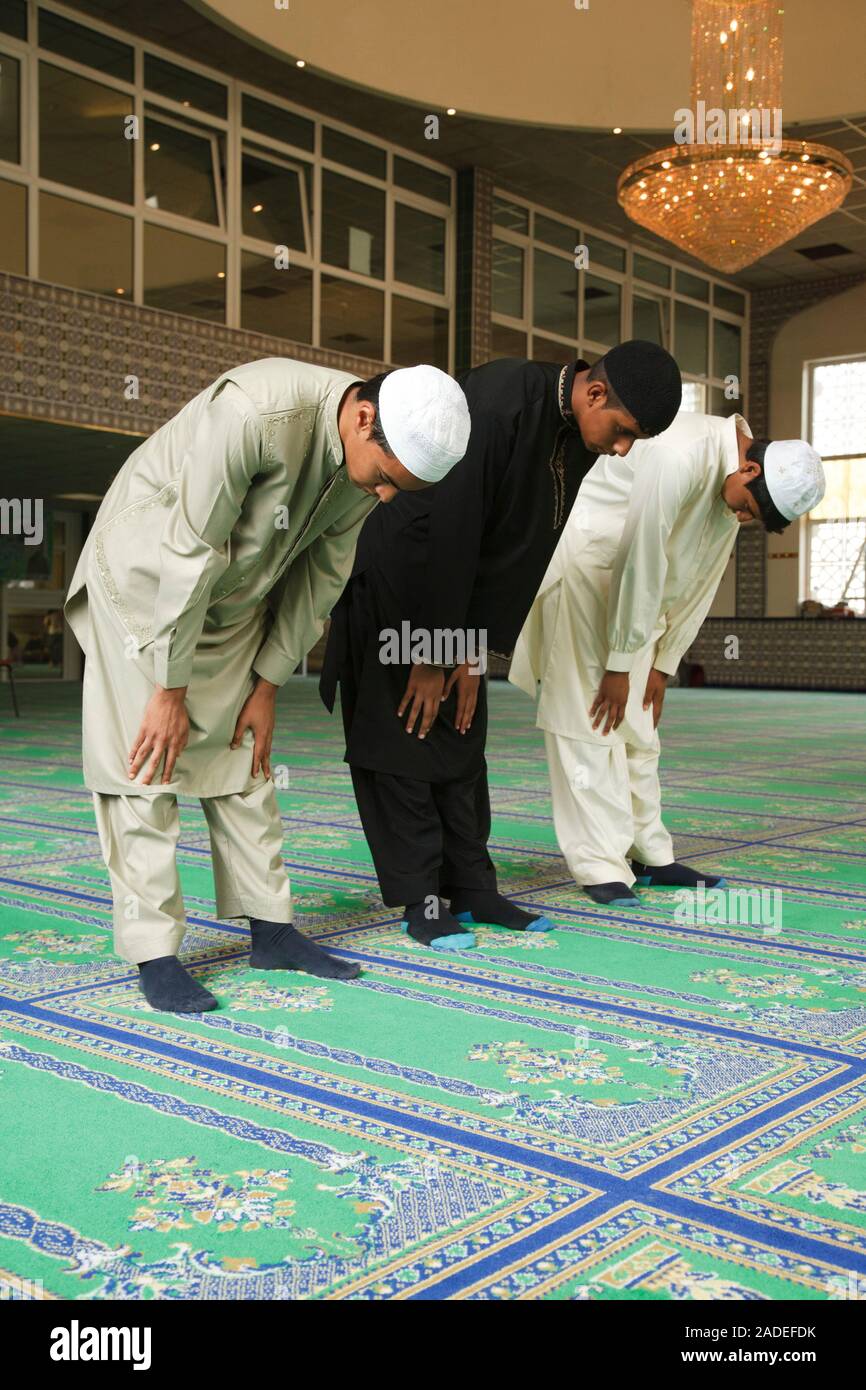 Muslim boys in stages of prayer in a Mosque Stock Photo - Alamy