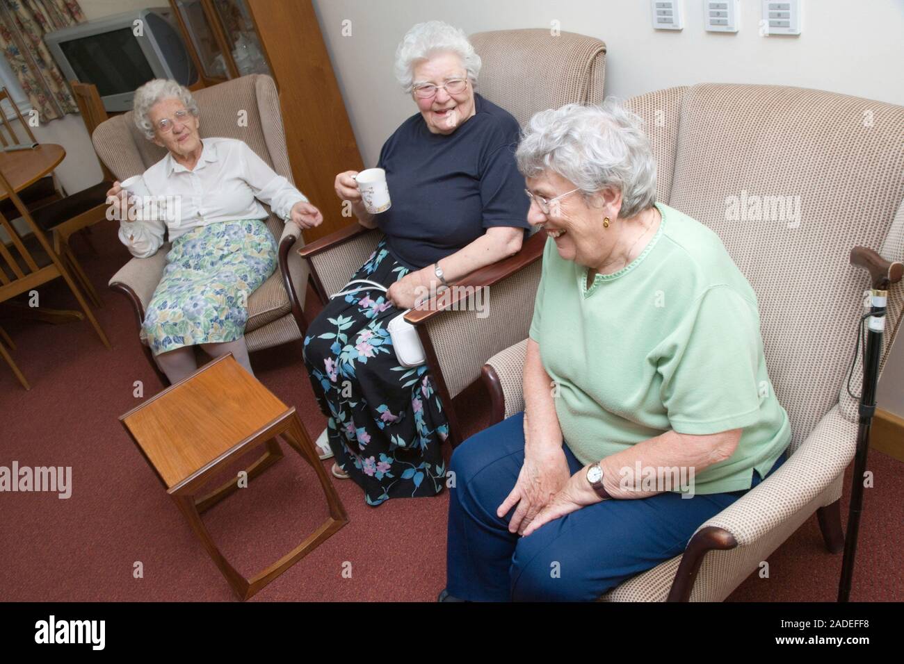 A group of older ladies enjoying a coffee morning in the communal ...