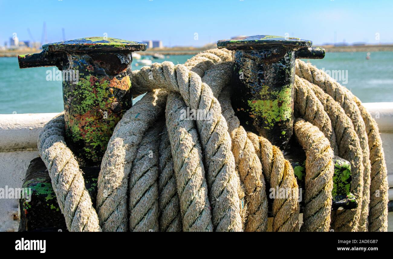 Weathered rope wrapped around a bollard on a ferryboat Stock Photo - Alamy