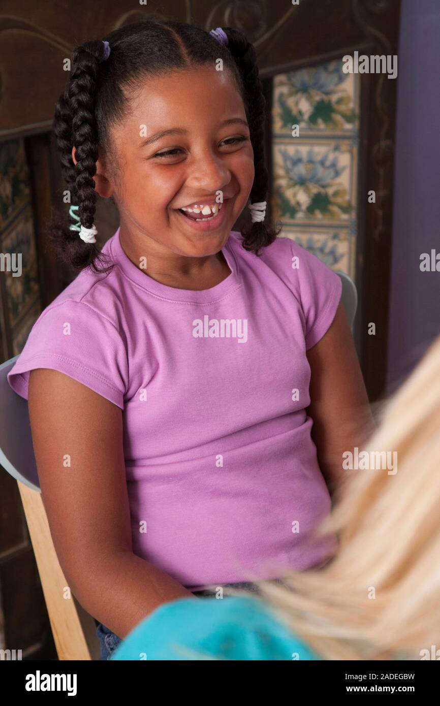 Social worker and child in centre Stock Photo - Alamy