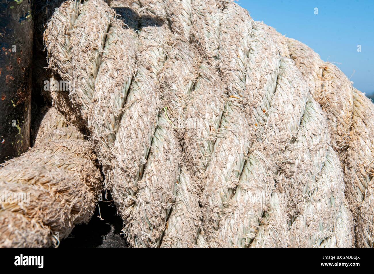 Weathered rope wrapped around a bollard on a ferryboat Stock Photo - Alamy