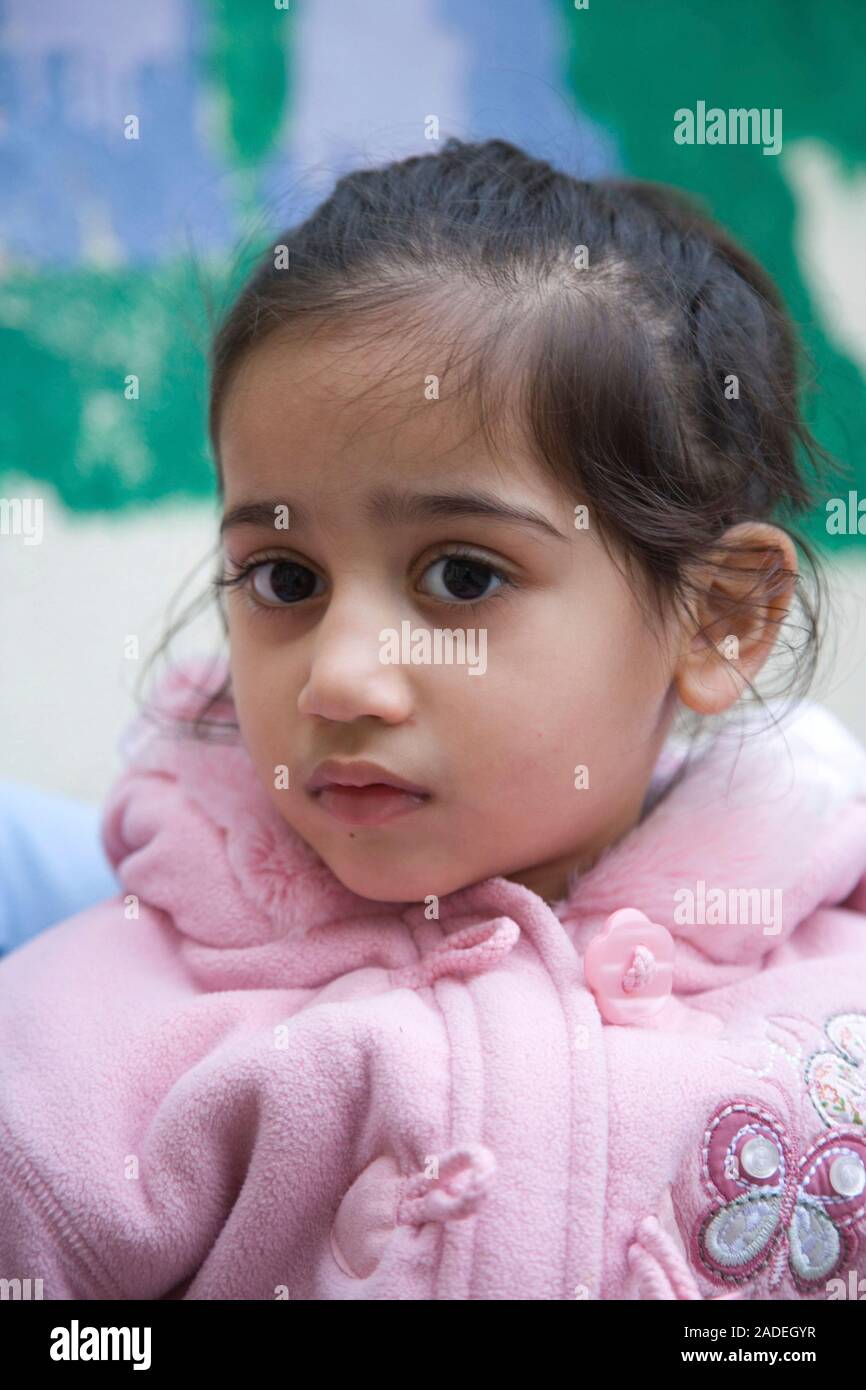 Little girl looking puzzled Stock Photo - Alamy