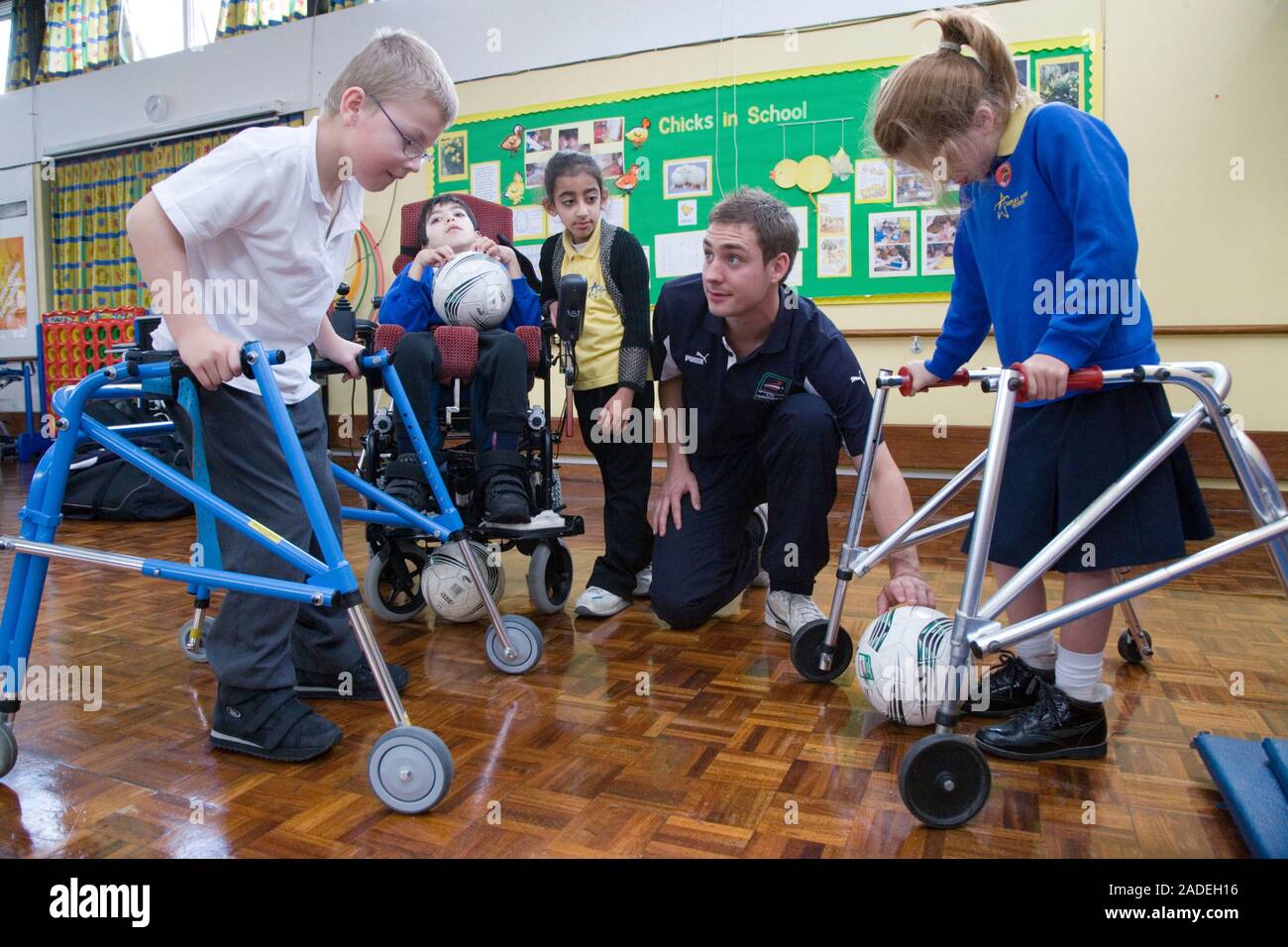 Children with disabilities playing indoor football Stock Photo - Alamy