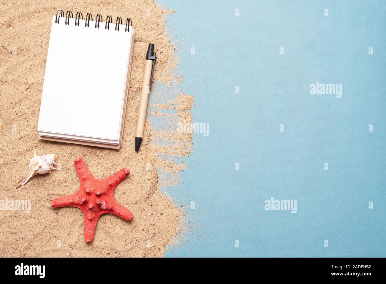 Notepad on the sand flat lay background. Sea vacation diary mockup ...