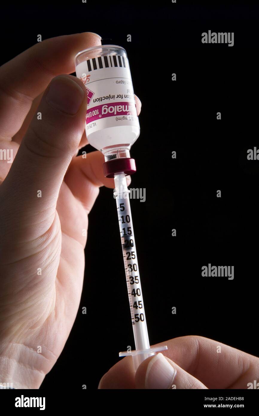 Man preparing insulin injection Stock Photo - Alamy