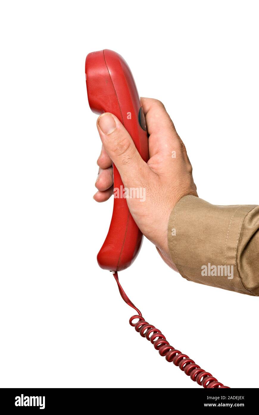 Red handset in hand Stock Photo - Alamy