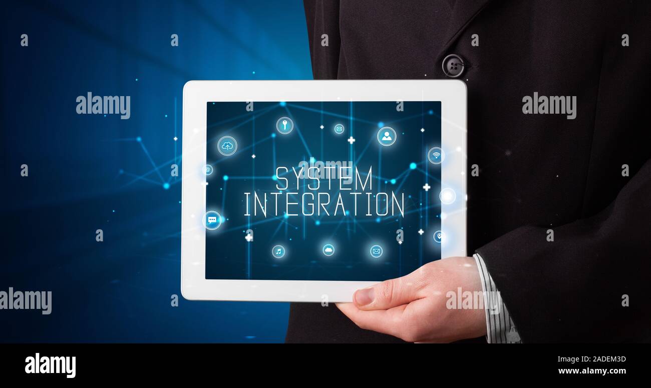 Young business person working on tablet and shows the digital sign ...