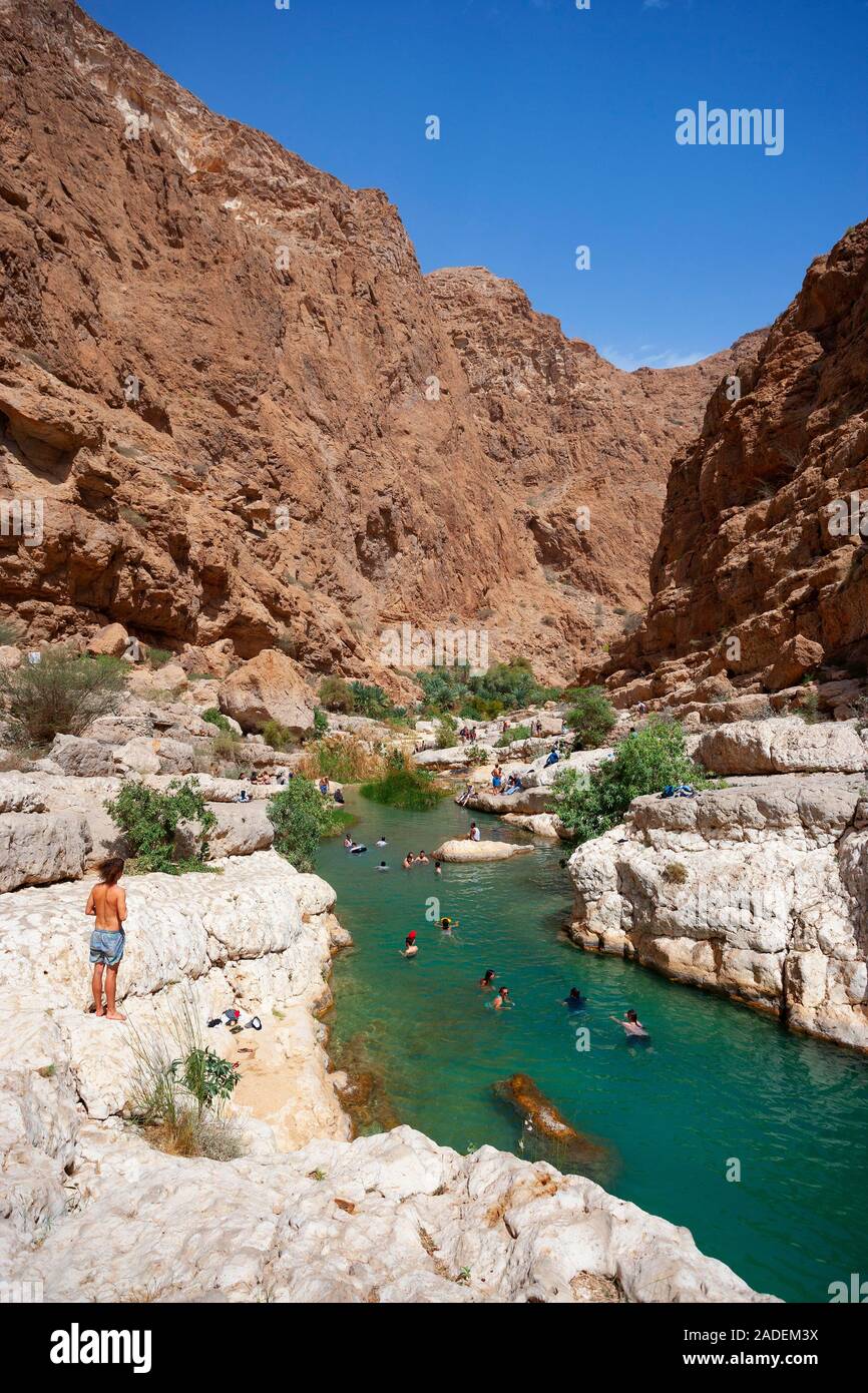 Freshwater pool between rugged cliffs, Wadi Shab, Shamal ash district ...
