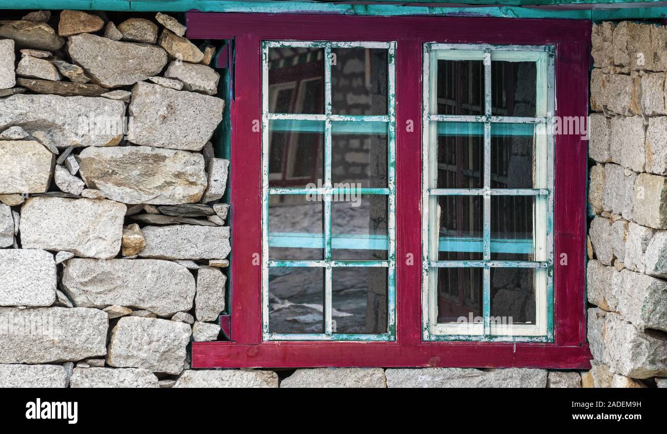 Stone wall with grunge window in a mountain hut Stock Photo - Alamy