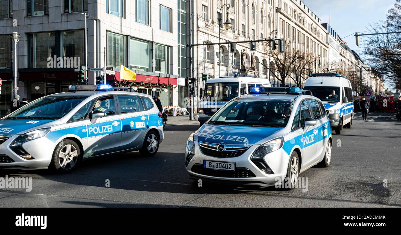 Police cars at the edge of the demonstration, climate strike, Fridays ...
