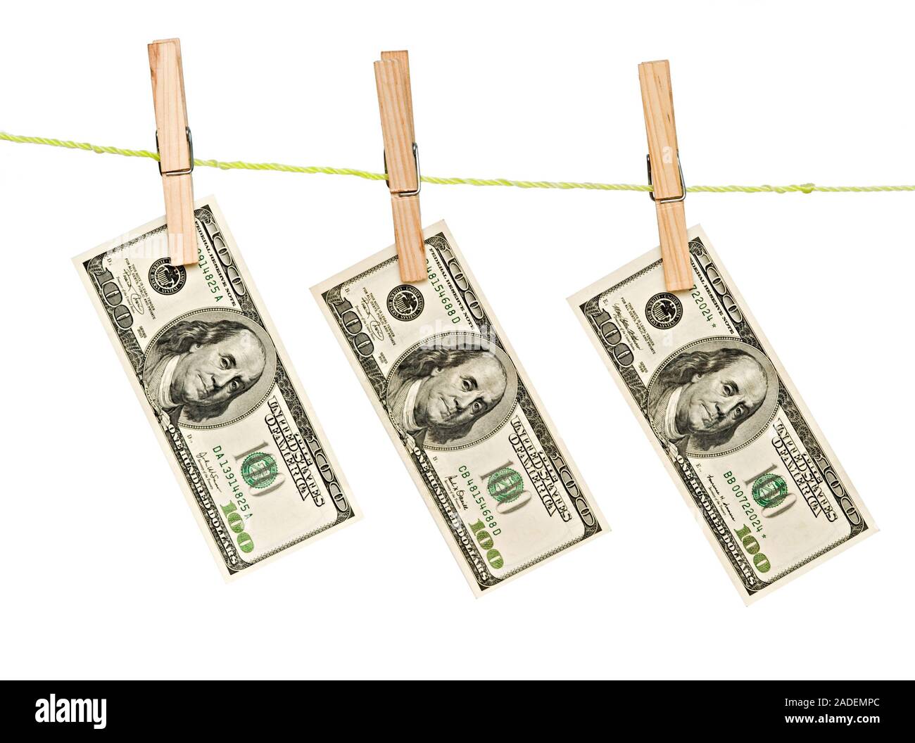 Dollar banknotes drying after laundry on rope Stock Photo - Alamy